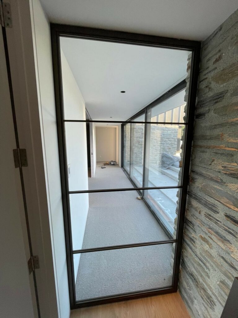 Steel Pivot Doors | Metal Pivot Door Designs | Wilford Walker