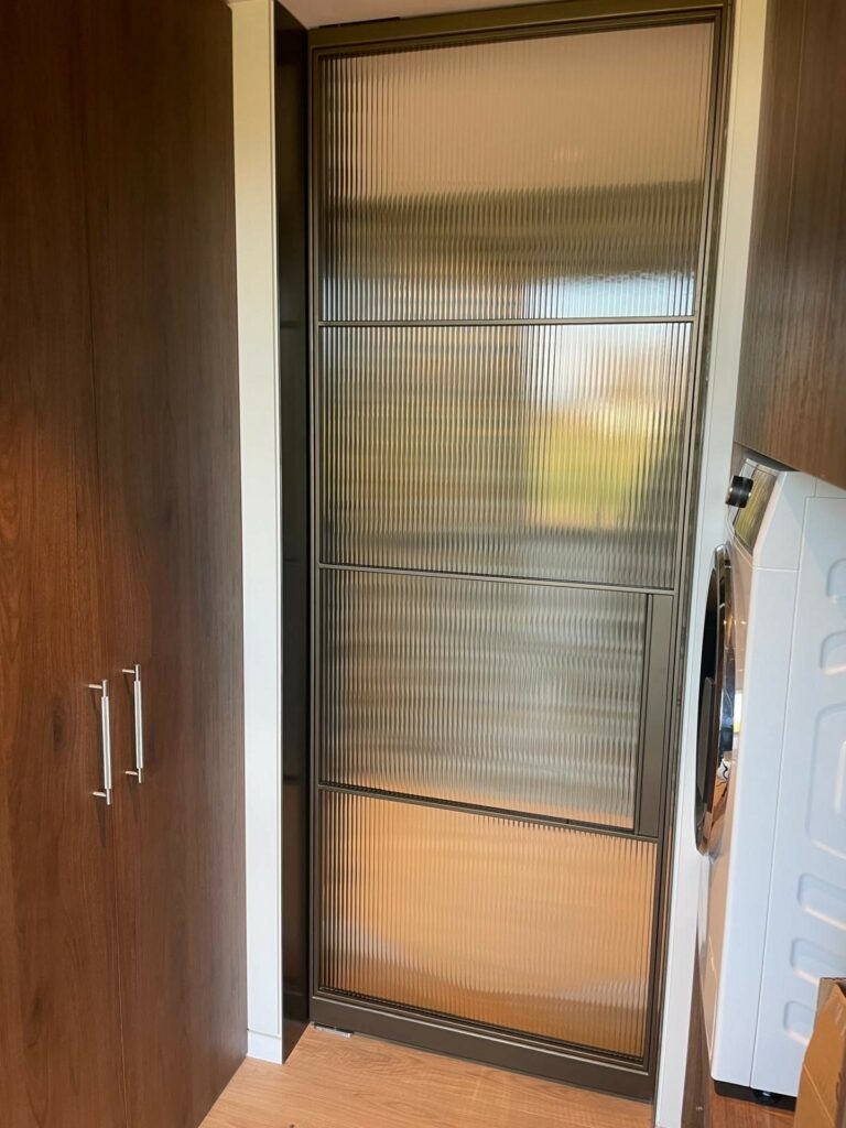 Steel Pivot Doors | Metal Pivot Door Designs | Wilford Walker